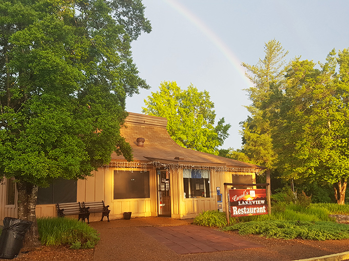 A rainbow arches over Carol's Lakeview Restaurant, as if nature itself is pointing the way to this unassuming culinary treasure in Cherokee Village.