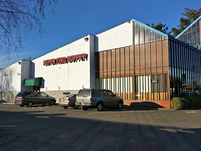 The unassuming exterior of Super King Buffet stands like a temple of abundance, its packed parking lot the first clue you've found Portland's buffet paradise.