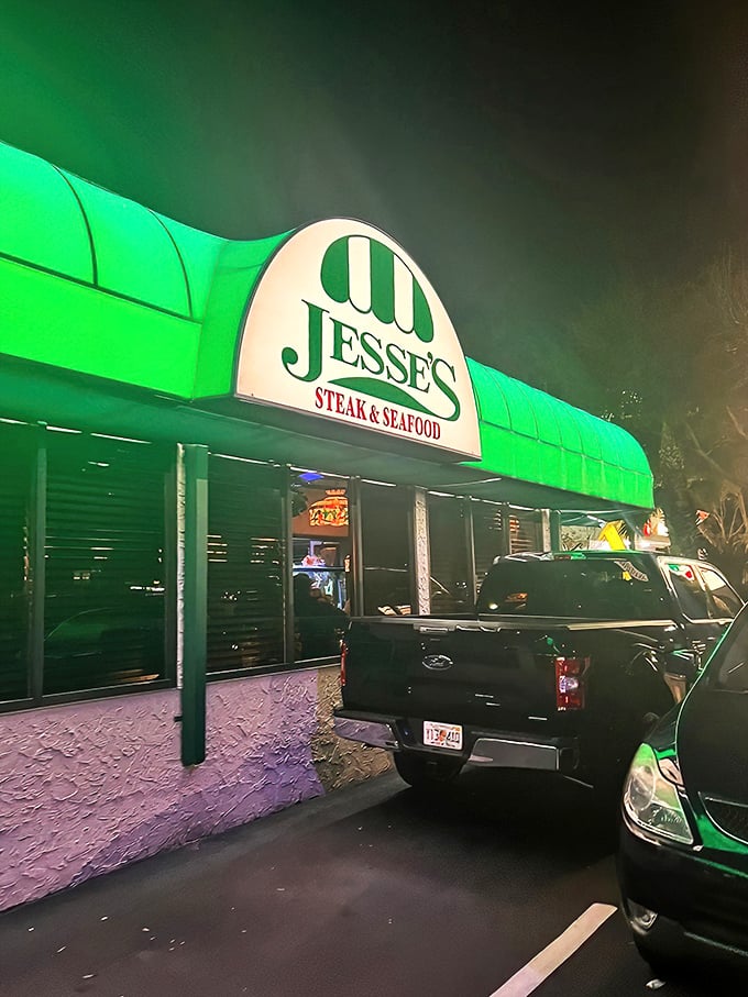 The iconic green awning of Jesse's Steak & Seafood stands as a beacon for hungry Floridians, promising old-school delights within those unassuming doors.