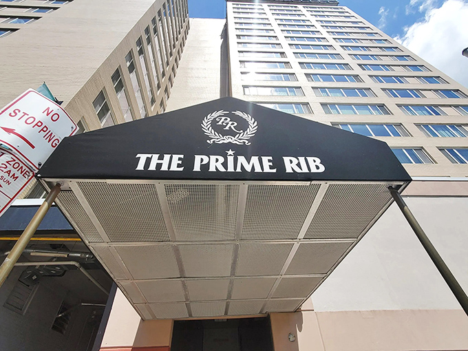 The understated elegance of The Prime Rib's entrance promises what lies beyond&mdash;a Baltimore dining institution where time stands deliciously still.