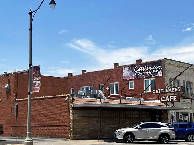 The iconic neon sign beckons hungry travelers like a carnivorous lighthouse in Oklahoma City's Stockyards. Some landmarks need no fancy frills.