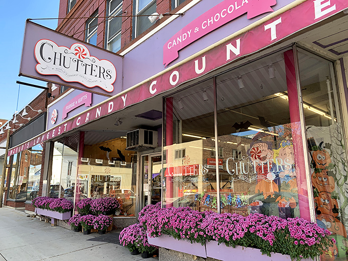 The iconic pink storefront of Chutters beckons like a sugary mirage on Littleton's Main Street. Those purple flowers aren't just decoration&mdash;they're a warning sign that willpower goes to die here.