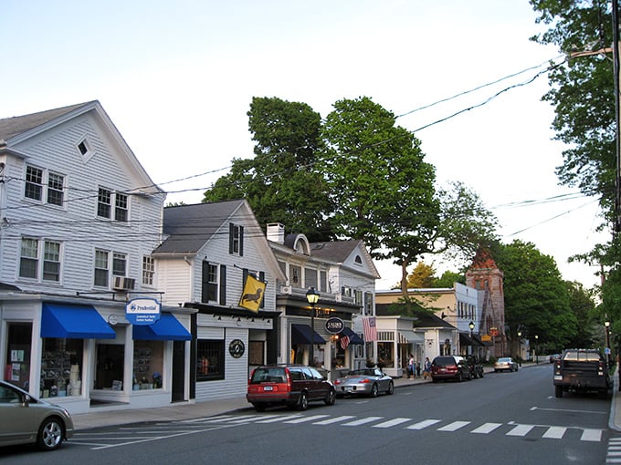 A quintessential New England scene where history meets waterfront charm. Essex's colonial buildings stand proudly against bare winter trees, inviting spring visitors to explore.
