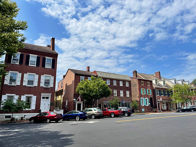 Colonial charm meets modern life on this corner of New Castle, where brick buildings have witnessed centuries of American history while patiently waiting for parallel parking to be perfected.