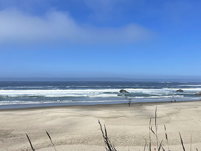 Nature's perfect amphitheater awaits at Short Sand Beach, where golden sand meets dramatic headlands in a secluded coastal embrace. 