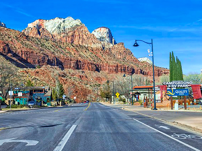 Springdale's main drag welcomes you with that perfect small-town charm, where towering red cliffs replace skyscrapers and nature writes the skyline.