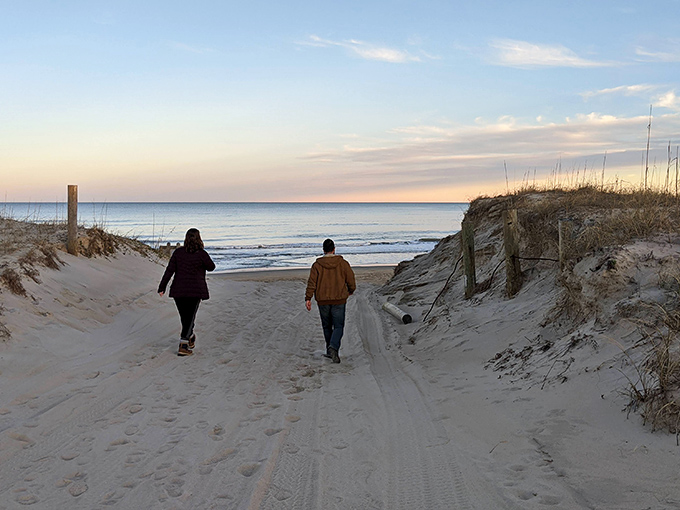 A bright yellow tent stands alone on miles of pristine shoreline. Social distancing at its most glorious natural extreme.