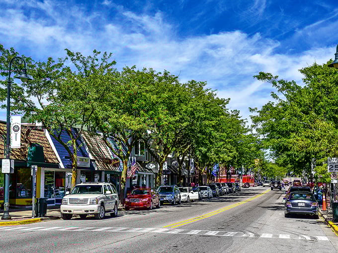 Downtown Charlevoix beckons with its charming storefronts and blue awnings, where Simonsen's Bakery promises sweet treasures worth every calorie.