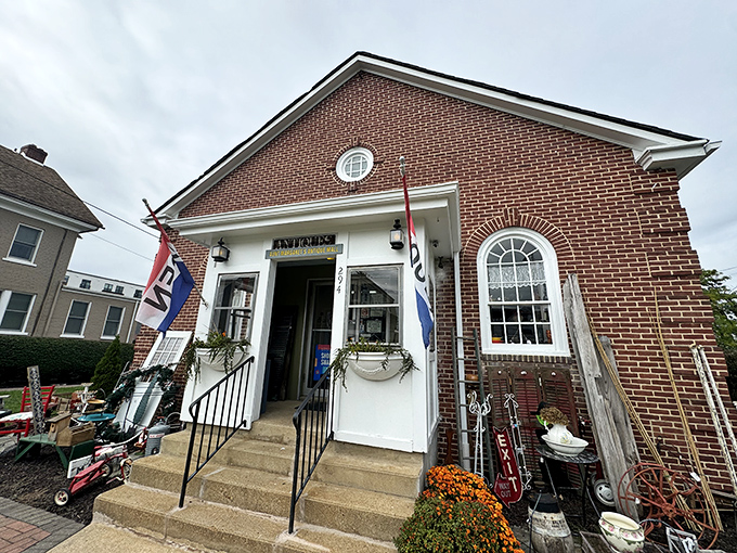 The charming brick exterior of Aunt Margaret's beckons with its round window and vintage lanterns&mdash;like a time portal disguised as a building.