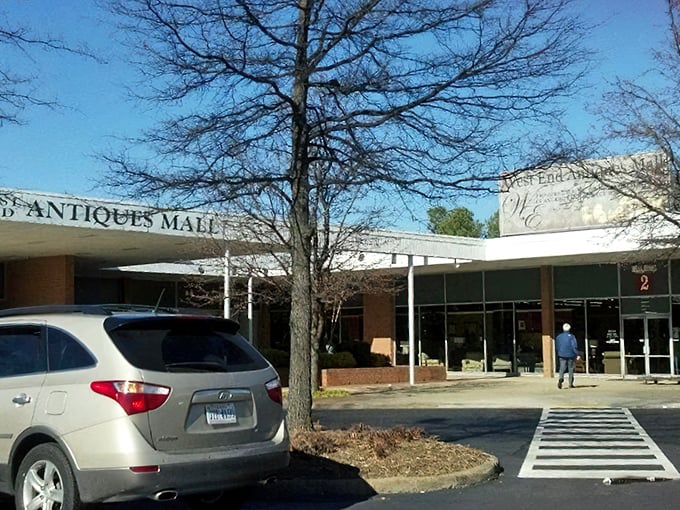 The unassuming brick exterior of West End Antiques Mall belies the wonderland of treasures waiting inside. Like a time-travel portal disguised as a 1970s department store.
