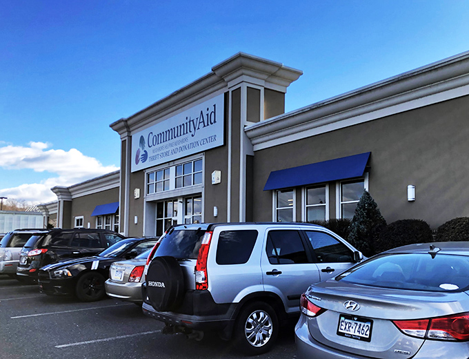 Welcome to the mothership of secondhand treasures! CommunityAid's exterior promises a universe of bargains waiting to be discovered inside.