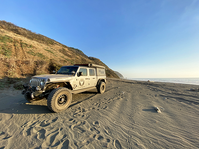 At Usal Beach, four-wheel-drive isn't just recommended—it's part of the adventure. Where golden hills meet dark sand, your vehicle becomes your coastal companion on California's wildest shoreline.