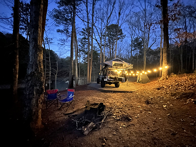 Twilight transforms Red Top Mountain campsites into magical retreats where string lights and forest shadows create the perfect evening sanctuary.