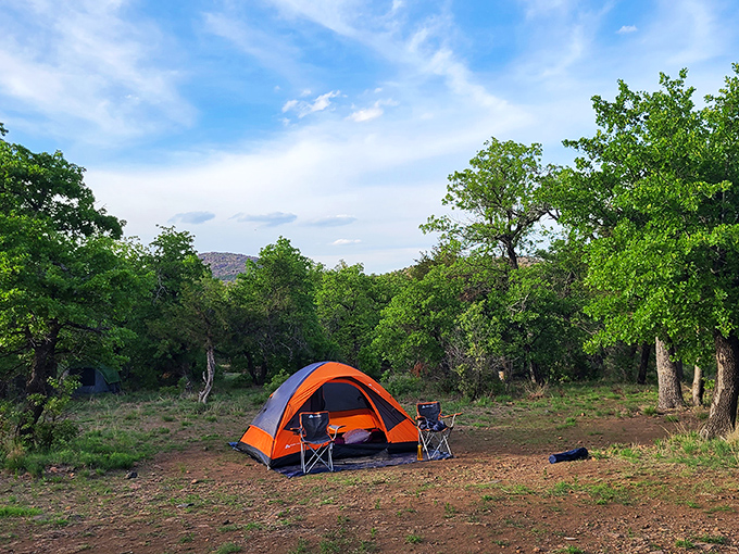 Home sweet wilderness! A cozy travel trailer nestled among autumn oaks creates the perfect basecamp for adventures in Oklahoma's rugged backcountry.