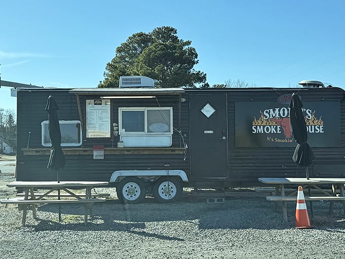 The black trailer with flames on the logo isn't just a food truck&mdash;it's a smoke-signaling beacon for BBQ pilgrims across Delaware.
