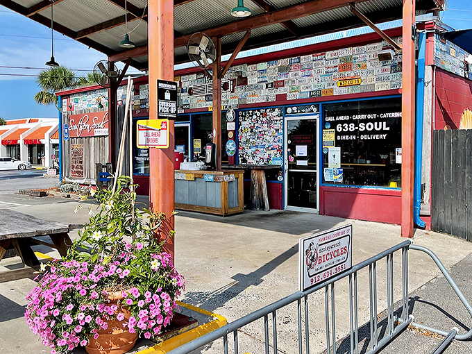 The converted gas station sanctuary where smoke signals beckon hungry pilgrims from miles around. Georgia's coastal barbecue haven awaits beneath that humble wooden awning.