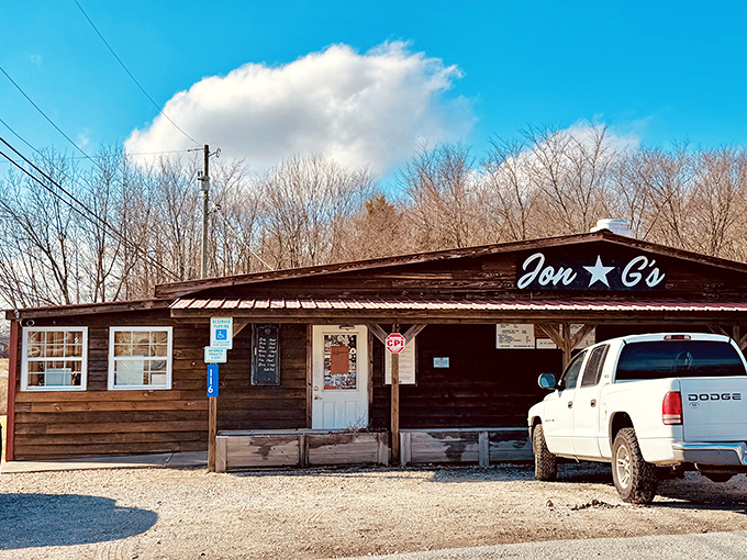 The line forms early at Jon G's rustic wooden facade, where BBQ pilgrims gather with the reverence of concert-goers awaiting a legendary headliner. 