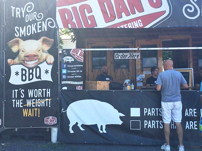 The rustic exterior of Big Dan's BBQ promises smoky treasures within. Red picnic tables invite you to dive into Pennsylvania's answer to Southern barbecue royalty.