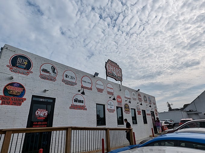 The iconic red awning and bull logo of Chap's Pit Beef welcomes meat lovers like a beacon of barbecue hope on Baltimore's Pulaski Highway.