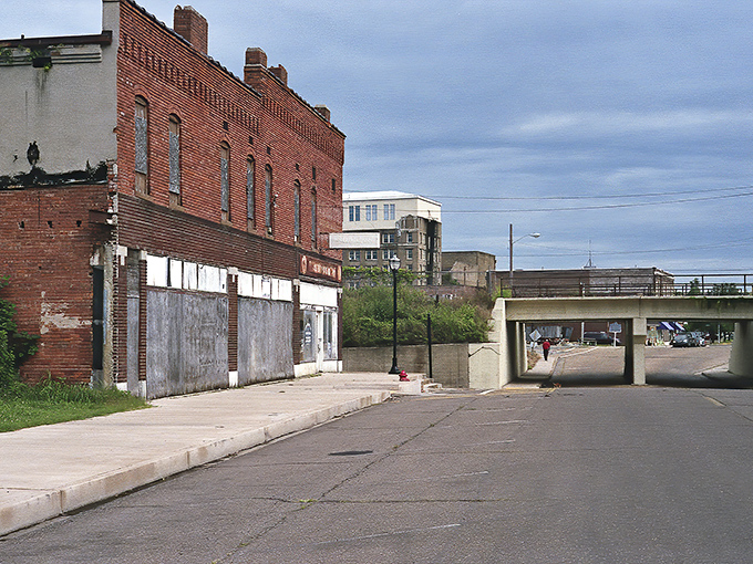 Downtown Clarksdale stands as a living museum of Mississippi Delta history, where brick buildings have absorbed decades of blues notes and barbecue smoke. 