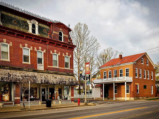 Historic brick buildings line Hermann's main street, where German heritage meets Midwest charm in a postcard-perfect small town setting. 