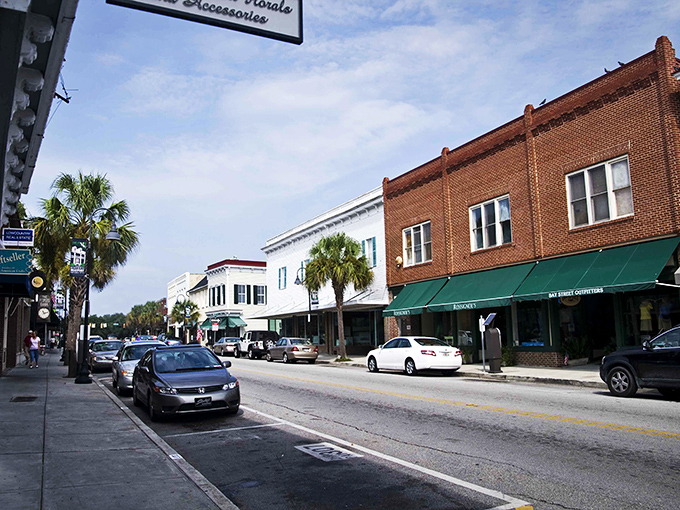 Bay Street beckons with its palm-lined charm, where historic buildings house culinary treasures waiting to be discovered around every corner.