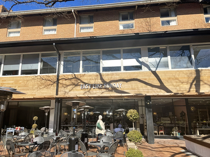 The warm wooden fa&ccedil;ade of Easy Like Sunday beckons like a culinary lighthouse, promising brunch salvation to hungry Baltimore souls.