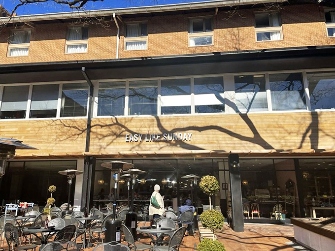 The golden wooden facade of Easy Like Sunday beckons like a sunrise, promising brunch dreams. Baltimore's answer to European cafe culture.