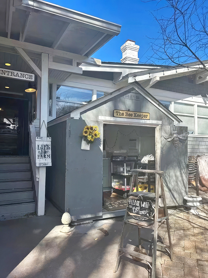 The entrance to The Bee and The Biscuit beckons charm and a promise of comfort food that'll make your morning sing.