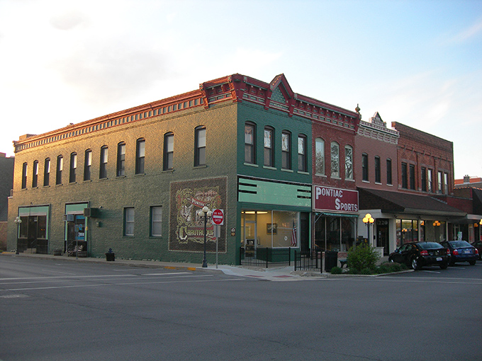 A classic car cruises past Pontiac's pristine brick buildings, like a scene from a time when gas was cheap and smartphones were science fiction.