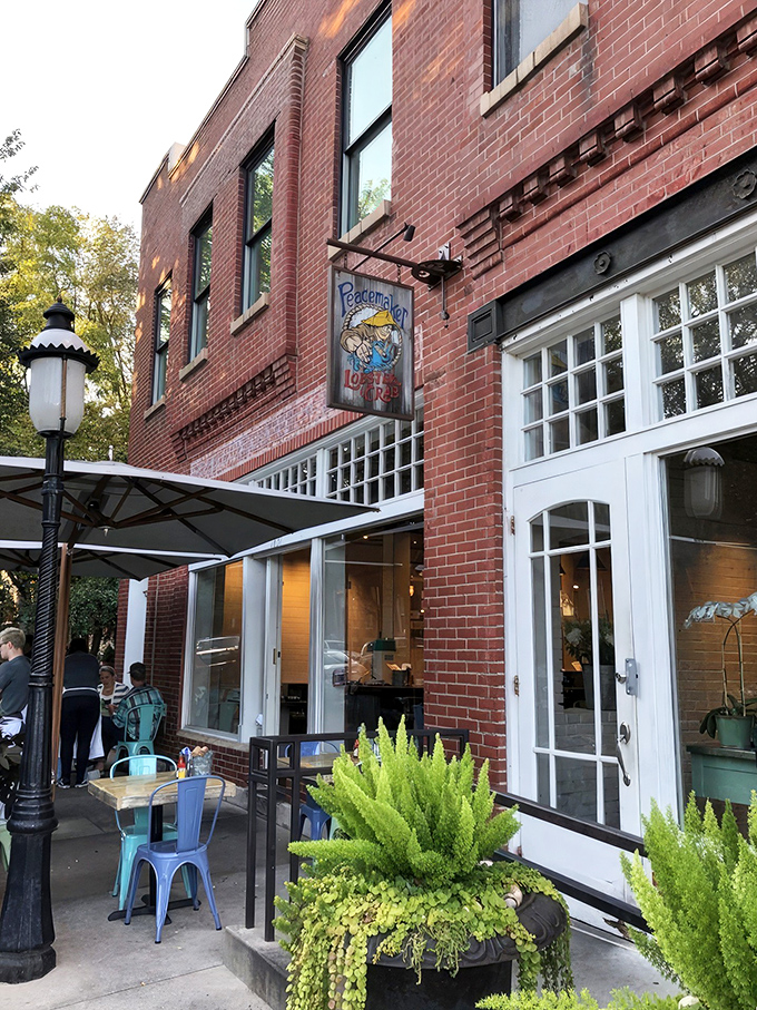The welcoming brick exterior of Peacemaker beckons seafood lovers like a lighthouse to ships, promising coastal delights in landlocked Missouri.