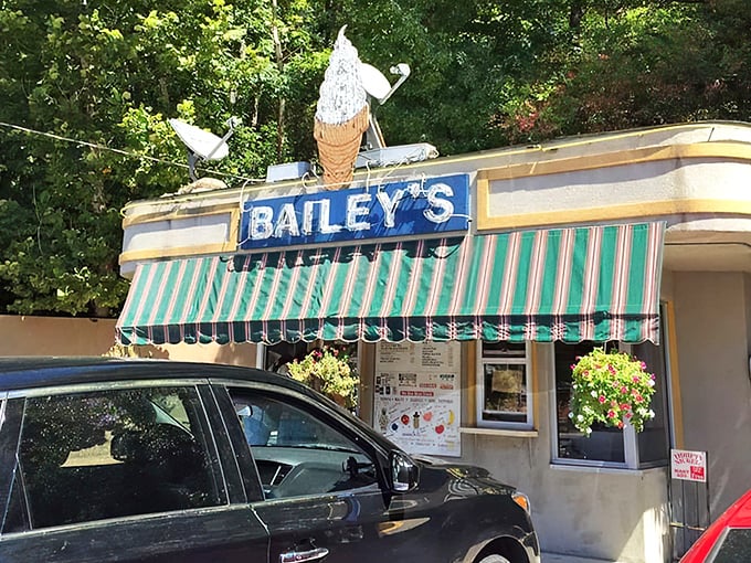 The ice cream cone atop Bailey's might be visible from space, but it's the green-striped awning that whispers "summer memories are made here."