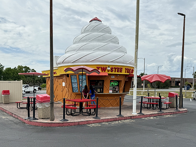 The mothership has landed! Twistee Treat's iconic cone-shaped building stands proudly against the Florida sky, beckoning ice cream lovers from miles around.