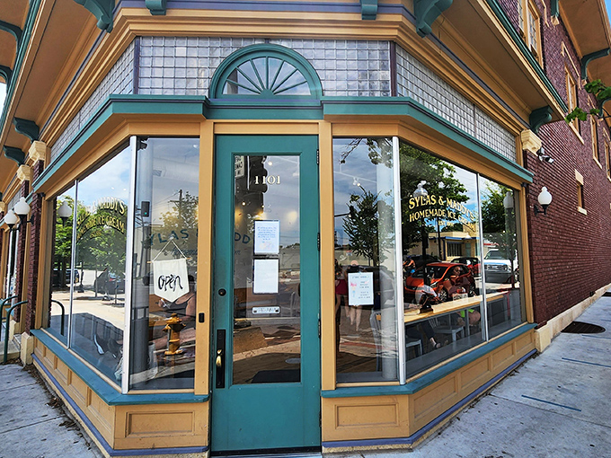 The blue-trimmed storefront of Sylas and Maddy's beckons like a cool oasis on Massachusetts Street, promising sweet relief from Kansas heat.