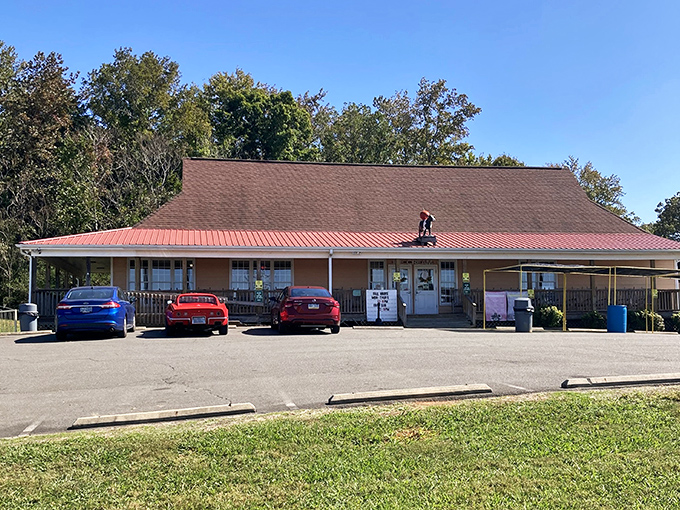 The iconic cow with a red cap stands guard atop this charming country store, promising dairy delights that are worth every mile of the journey.
