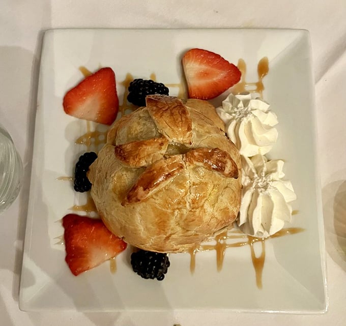 This isn't just apple dumpling&mdash;it's apple dumpling with ambition! Berries, caramel, and whipped cream elevate this classic to red-carpet status.