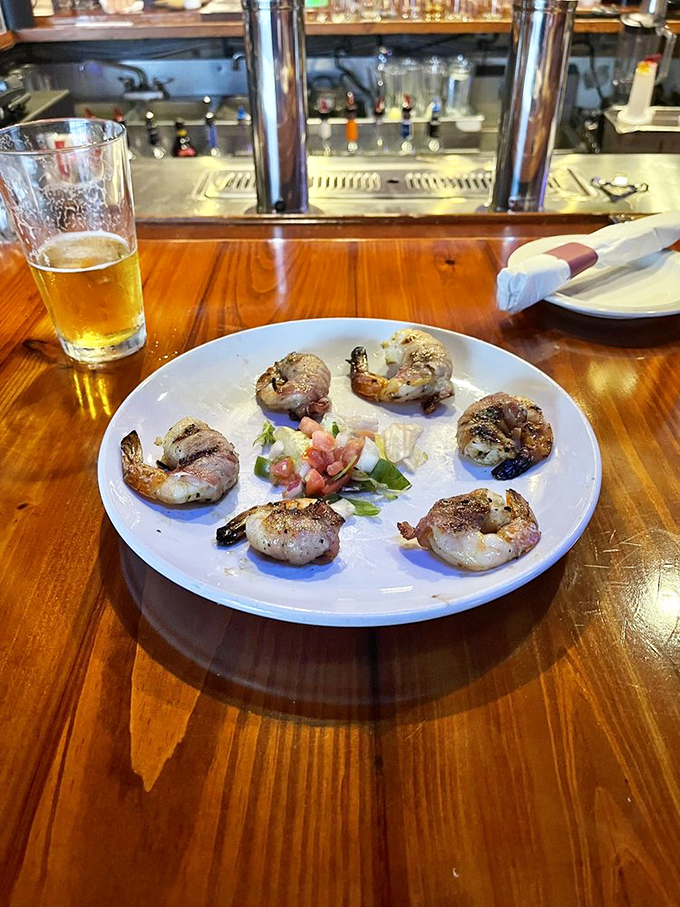 These bacon-wrapped shrimp are like little ambassadors of flavor. The perfect starter before the main beef event begins.