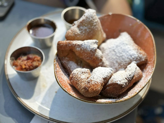 These beignets aren't just fried dough&mdash;they're pillows of possibility. Three dipping options because important decisions should always come in threes.