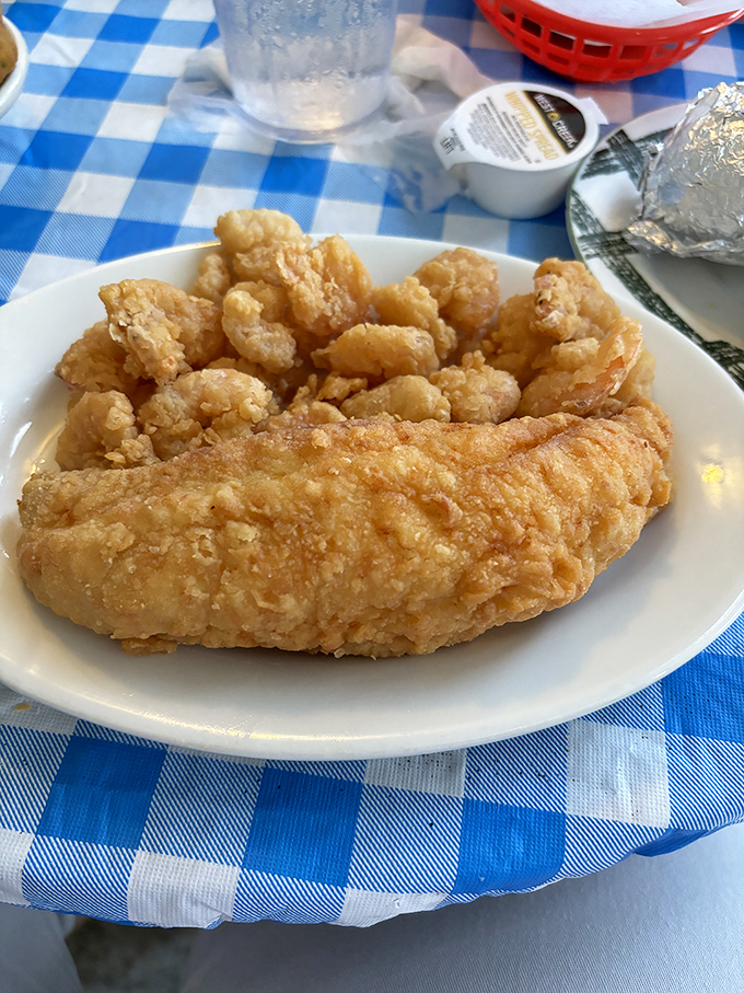 Simple perfection: flounder and shrimp that need no fancy garnish. On a blue checkered tablecloth, even Michelin inspectors would forget their pretensions.