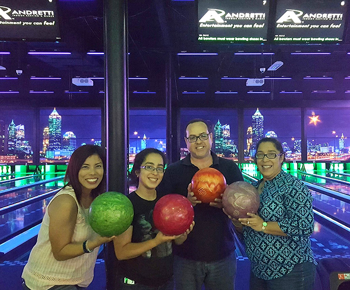 Bowling balls have never looked so good as when they're poised for action against the backdrop of Atlanta's skyline. Strike-worthy ambiance indeed.