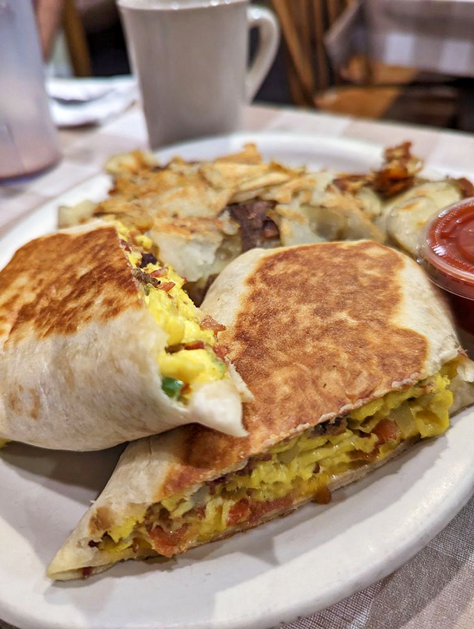 Breakfast burritos elsewhere just became aware they're living in the shadow of greatness. This golden-grilled package delivers morning bliss with every bite.