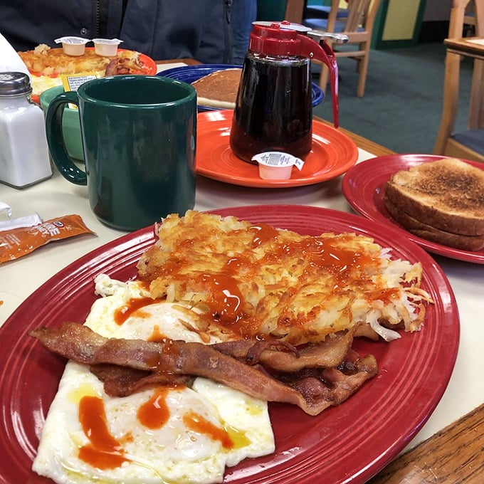 The breakfast platter that launched a thousand productive days&mdash;eggs, hash browns, bacon, and hot sauce in perfect harmony.