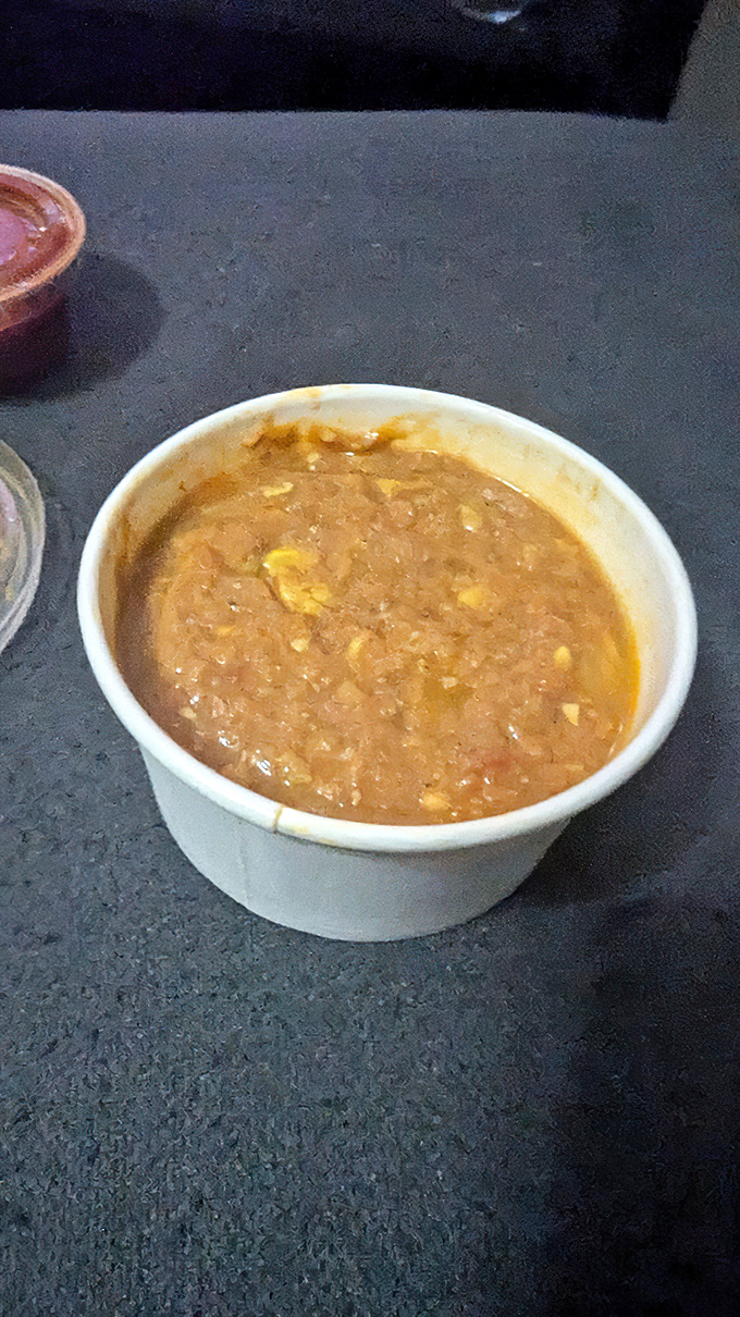 Brunswick stew &ndash; where Georgia's garden and smokehouse meet for a slow dance in a tomato-based broth that tastes like Southern history.