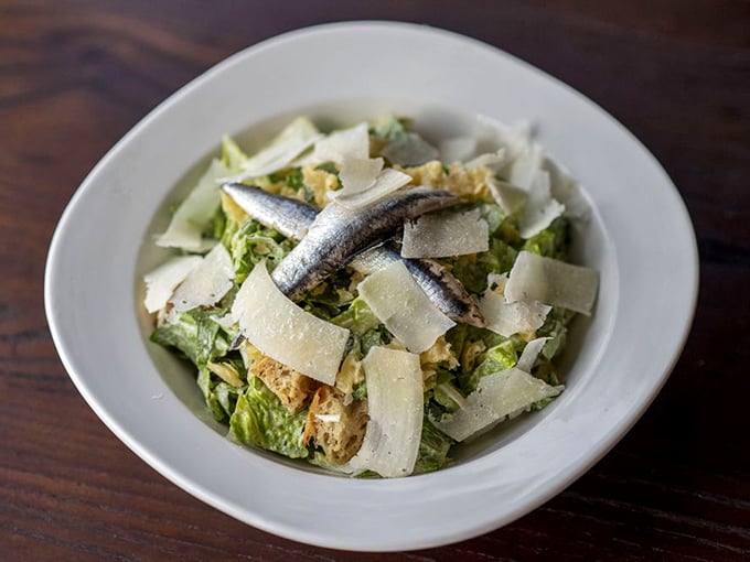 A proper Caesar salad with actual anchovies? That's not just a salad—that's respect for tradition in bowl form.