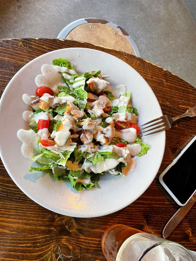 A Caesar salad that actually deserves its imperial name, with grilled chicken that didn't just visit the grill&mdash;it made friends there.