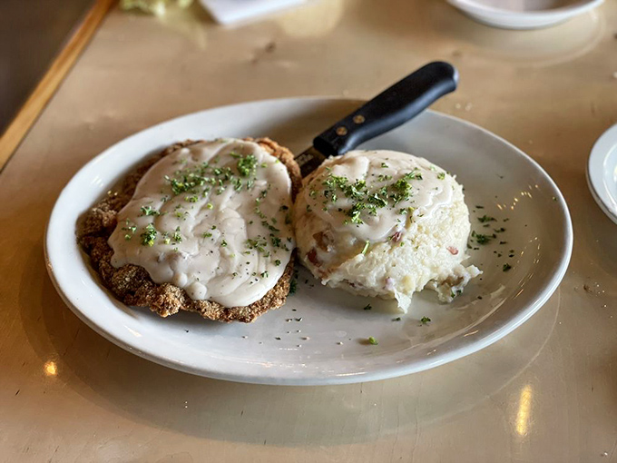 Chicken fried steak with gravy so good you'll want to write it a thank-you note. Country comfort food that makes you feel hugged from the inside.