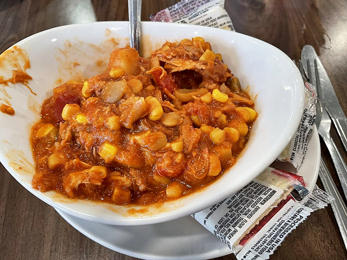 Brunswick stew: where tomatoes, lima beans, corn and tender meat come together in a Southern symphony that tastes like someone's grandma made it.