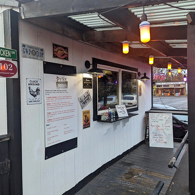 The ordering window &ndash; that magical portal where chicken dreams are spoken into existence before emerging as crispy, spicy reality. 