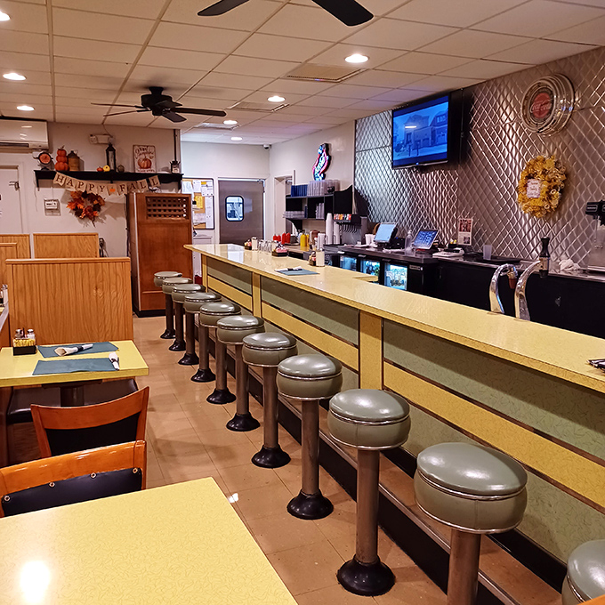 Counter seats &ndash; where solo diners become temporary family and the best local gossip is served alongside your breakfast special.