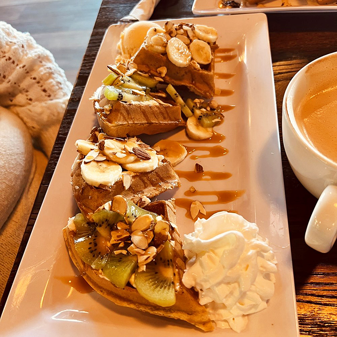 Fruit, nuts, and cream atop golden waffles&mdash;like a treasure map where X marks every delicious spot. The whipped cream is just the beginning.